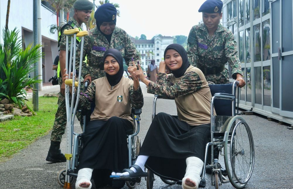 PRN: Tetap mengundi walaupun cedera - Kosmo Digital